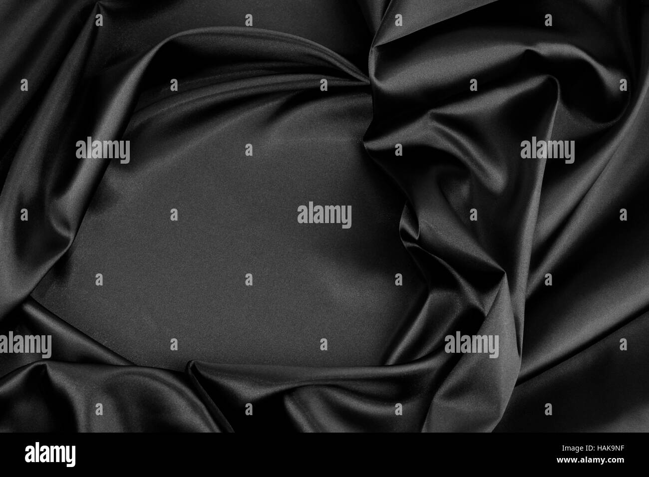 Closeup of rippled black silk fabric Stock Photo - Alamy