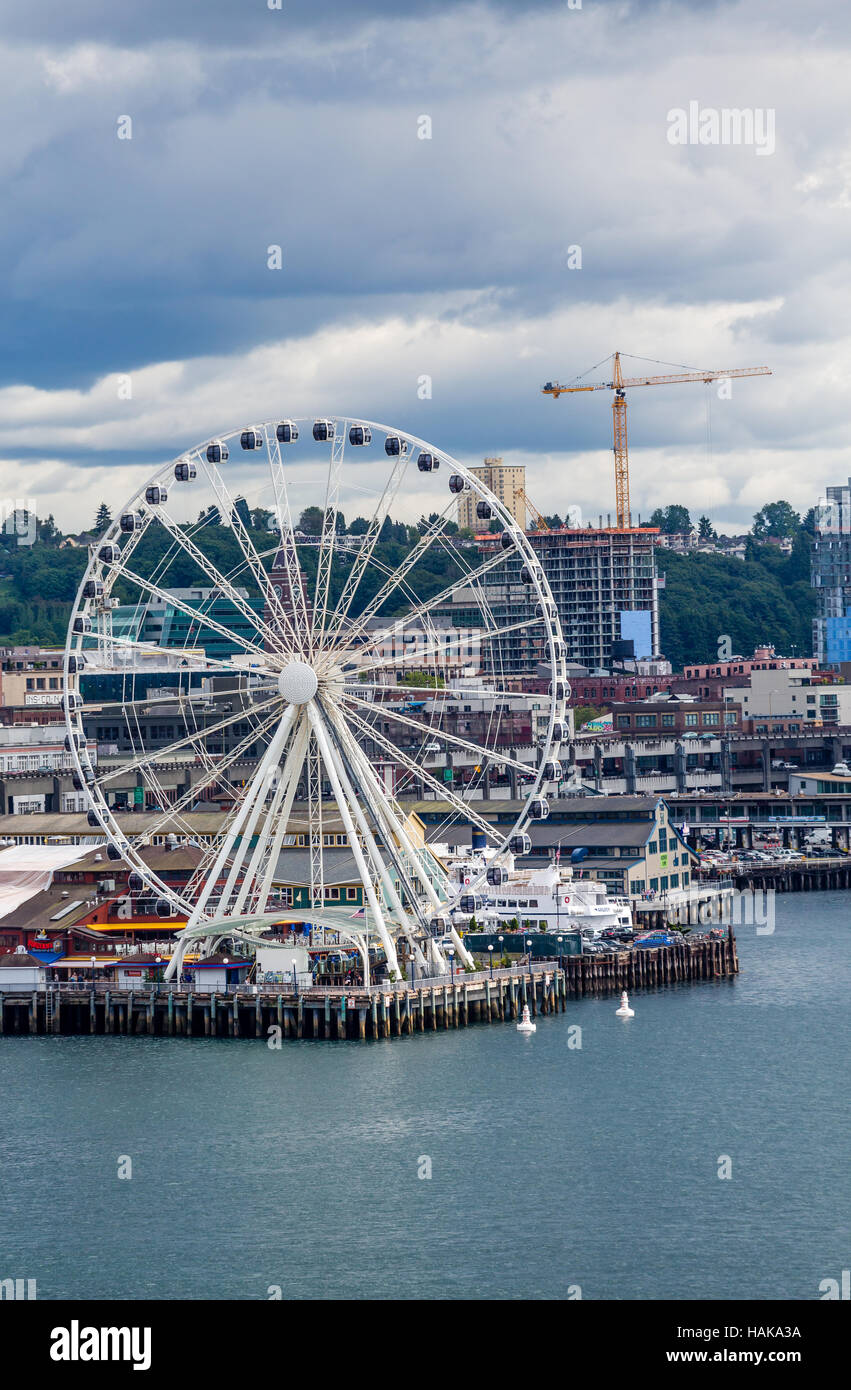 Waterfront architecture of Seattle featuing the new ferris wheel Stock ...