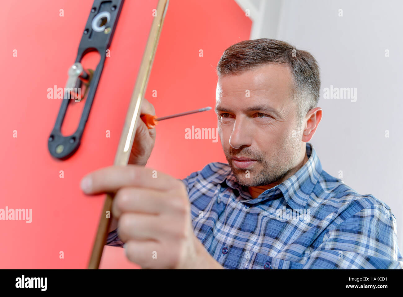 Changing a lock Stock Photo - Alamy