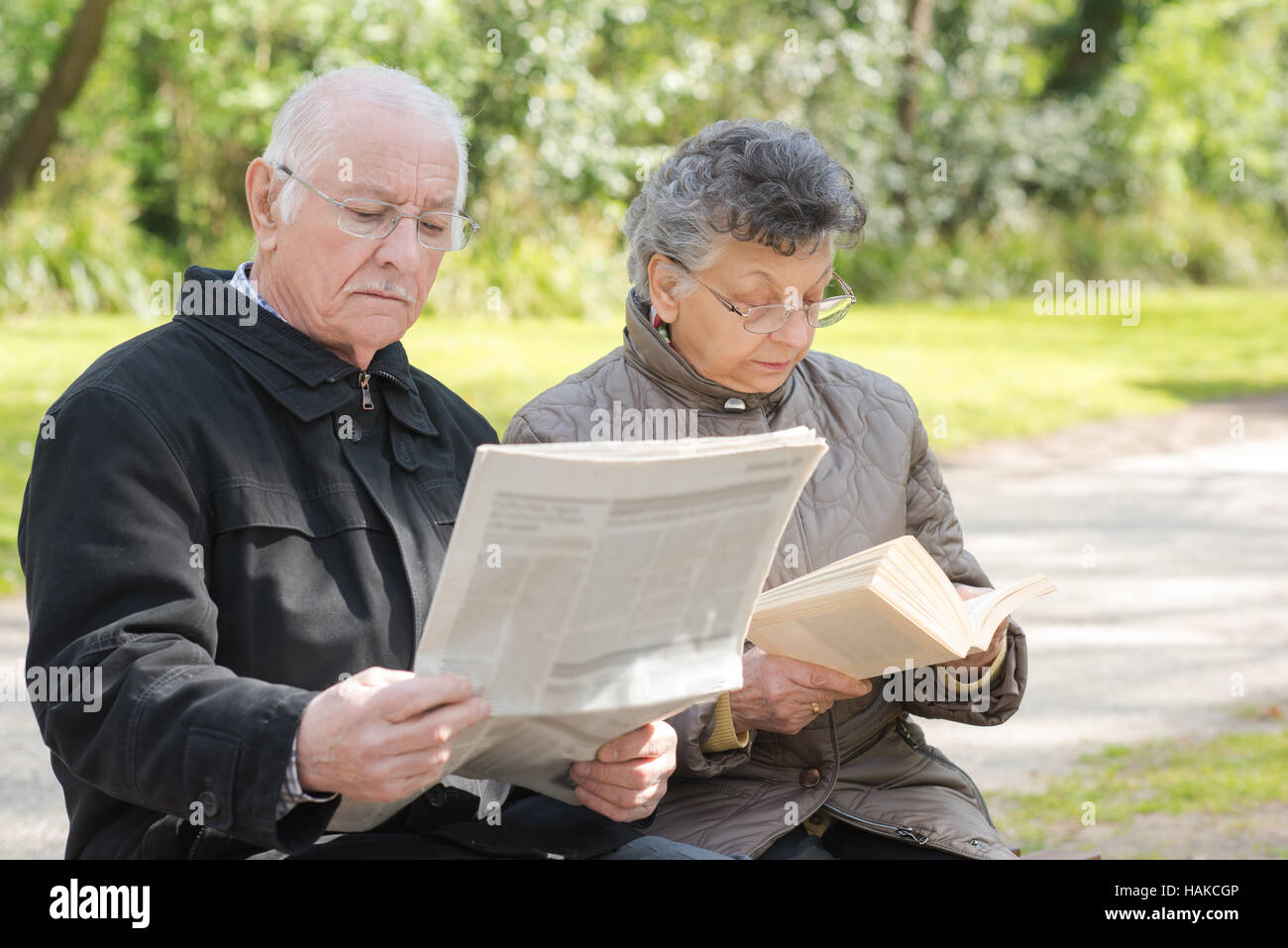 Old female author reading hi-res stock photography and images - Alamy