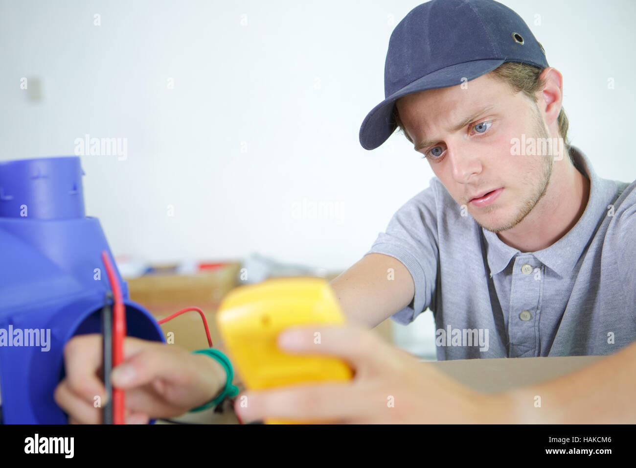 Man multimeter hi-res stock photography and images - Alamy