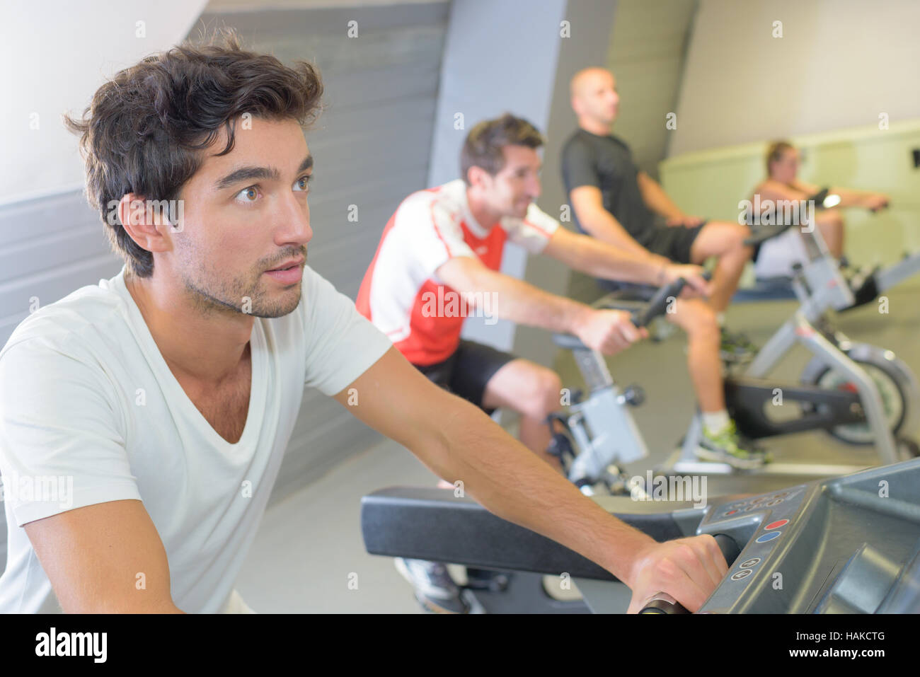 Cycling gym bike men hi-res stock photography and images - Alamy