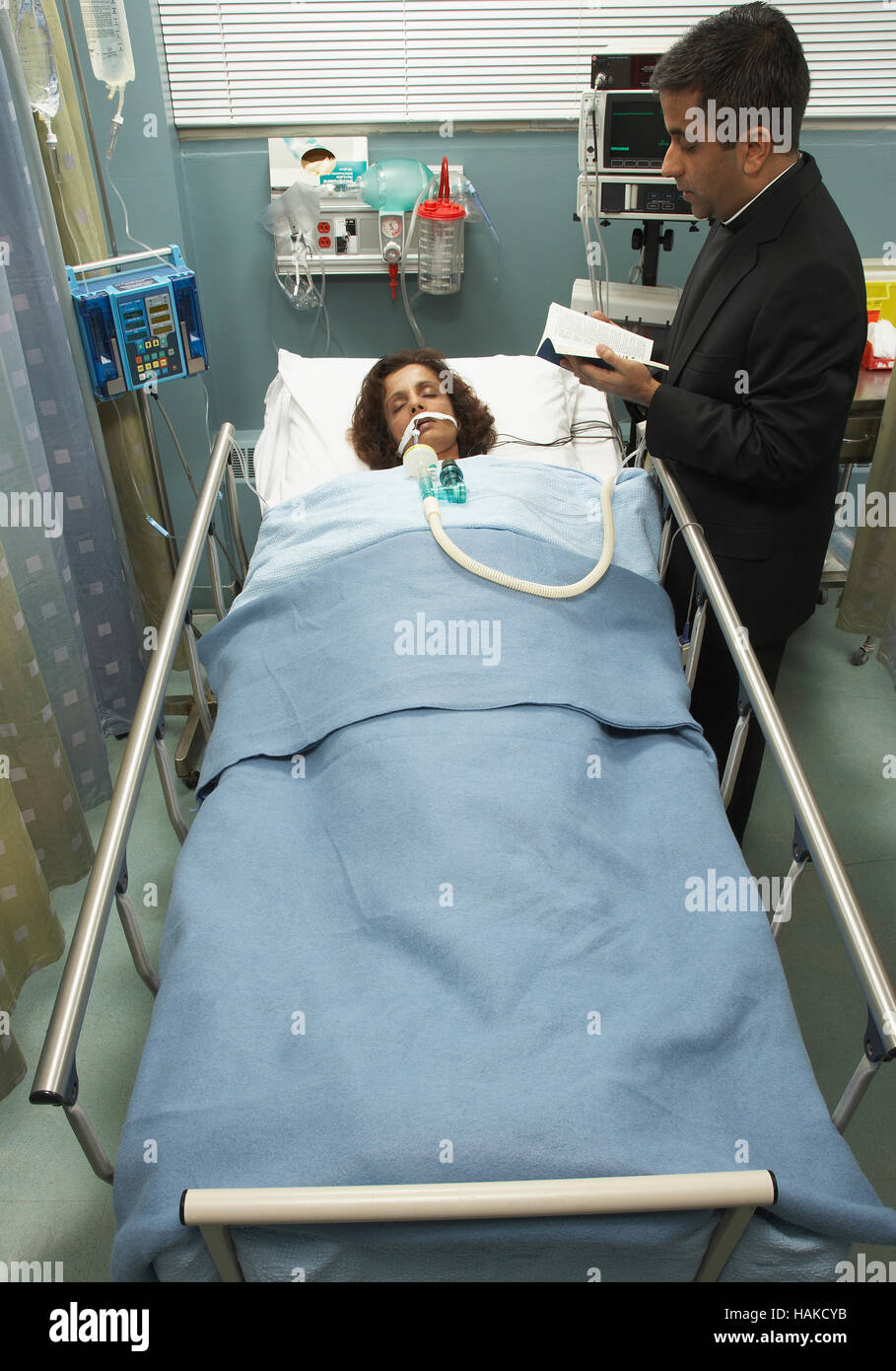 Reading last rites hi-res stock photography and images - Alamy