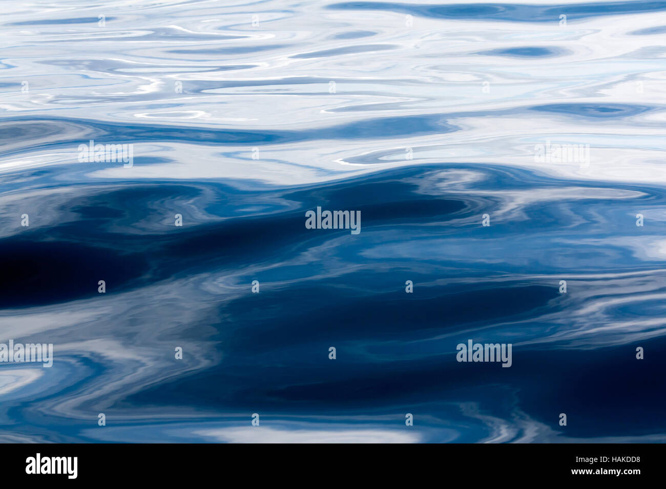 Reflections of waves and ripples on deep ocean water surface Stock ...