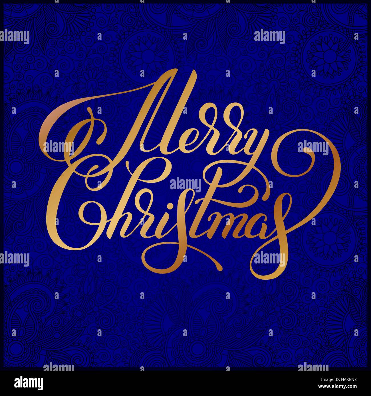 Merry Christmas gold calligraphic hand lettering on blue ornamen Stock ...