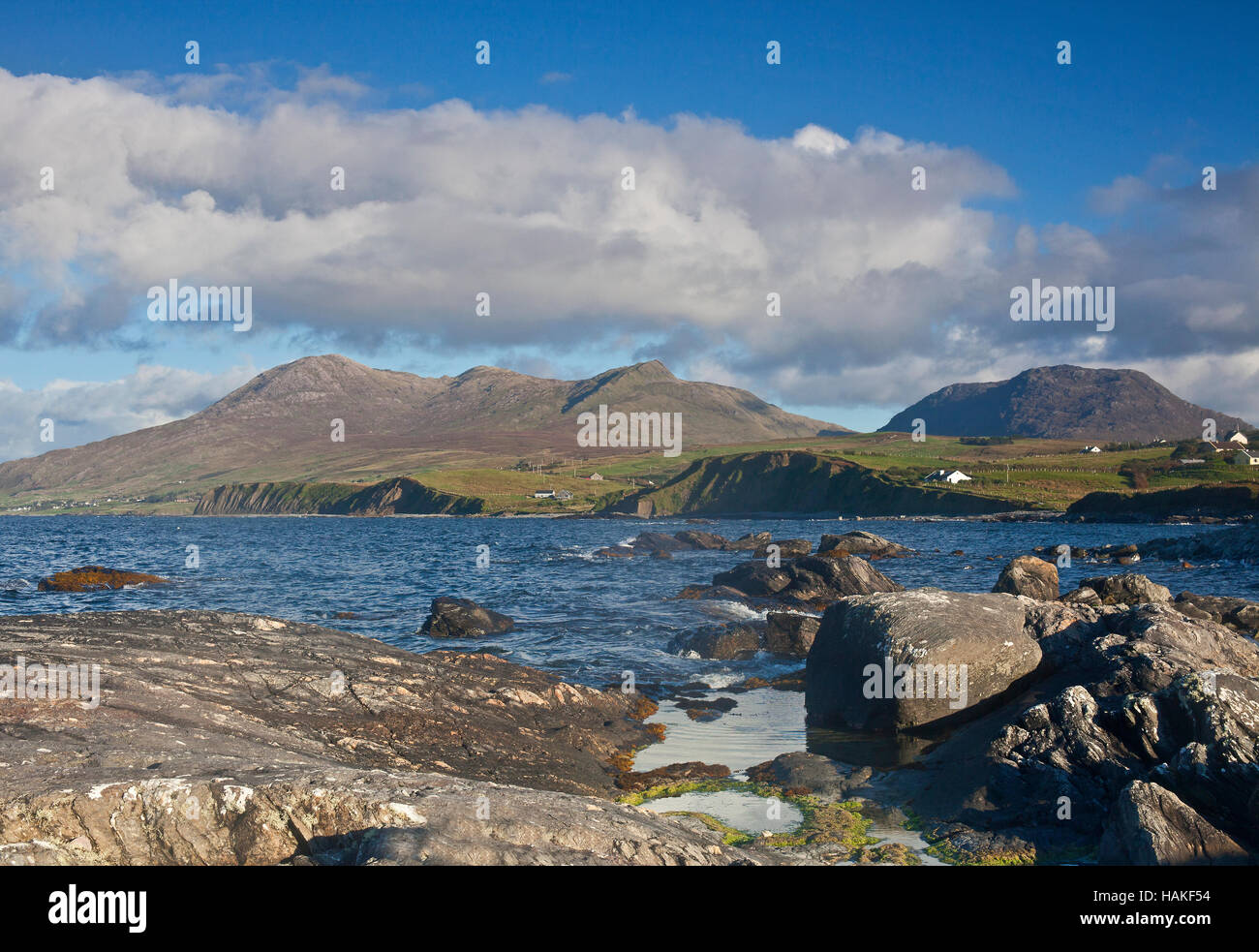 Rock pools and coastal cliffs at the Renvyle Peninsula, Connemara ...