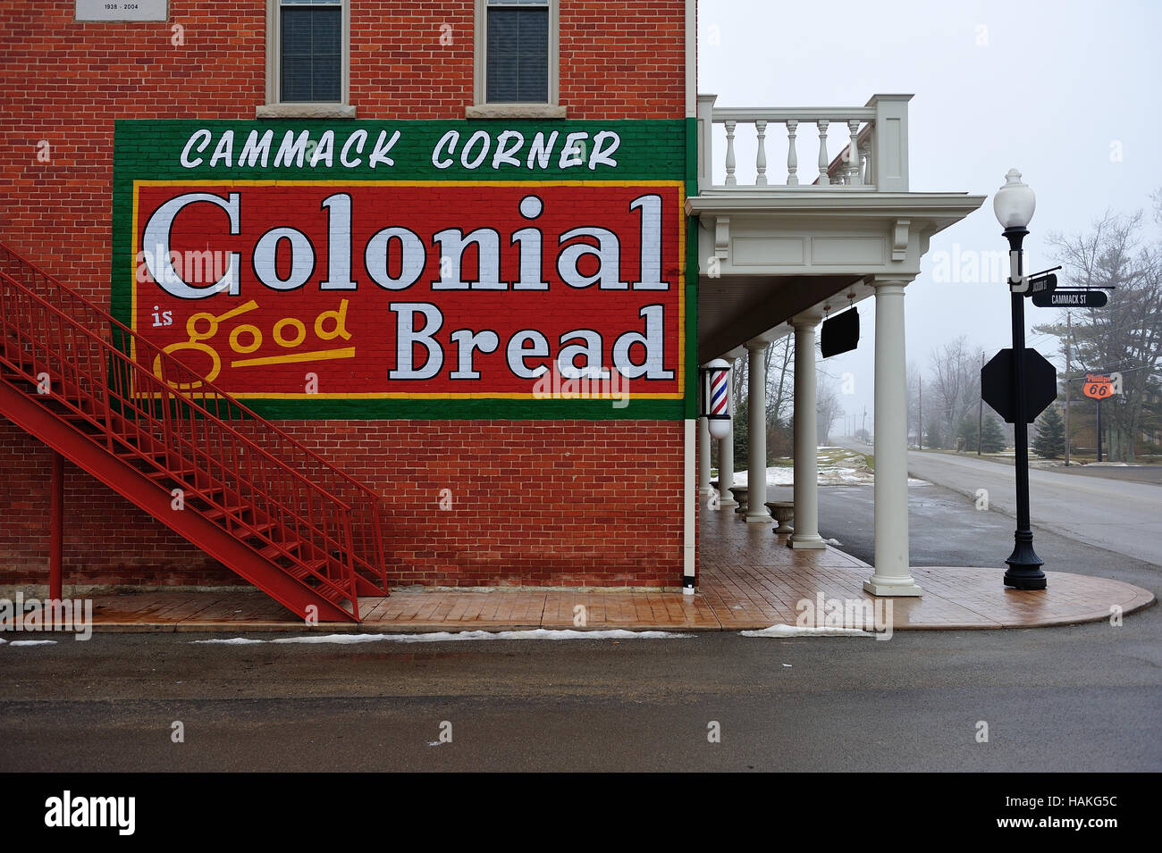 A painted Colonial Bread sign on the side of a general store in central ...