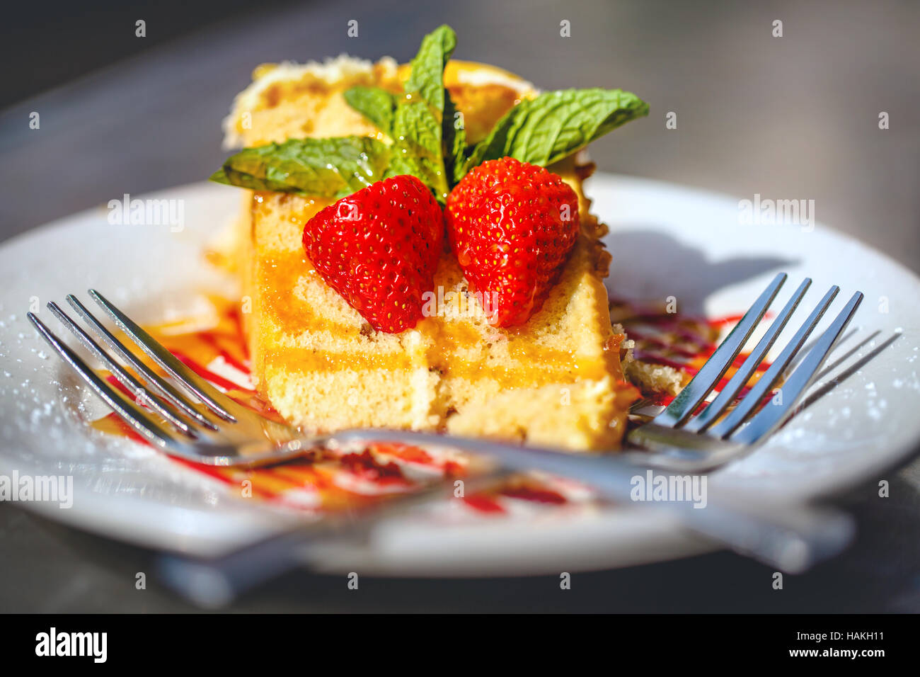 Two forks one cake hi-res stock photography and images - Alamy