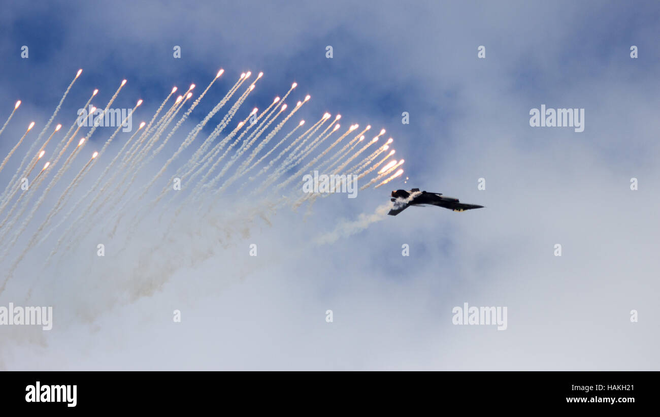 F-16 firing flares during a performance at the Dutch Air Force Open Day ...
