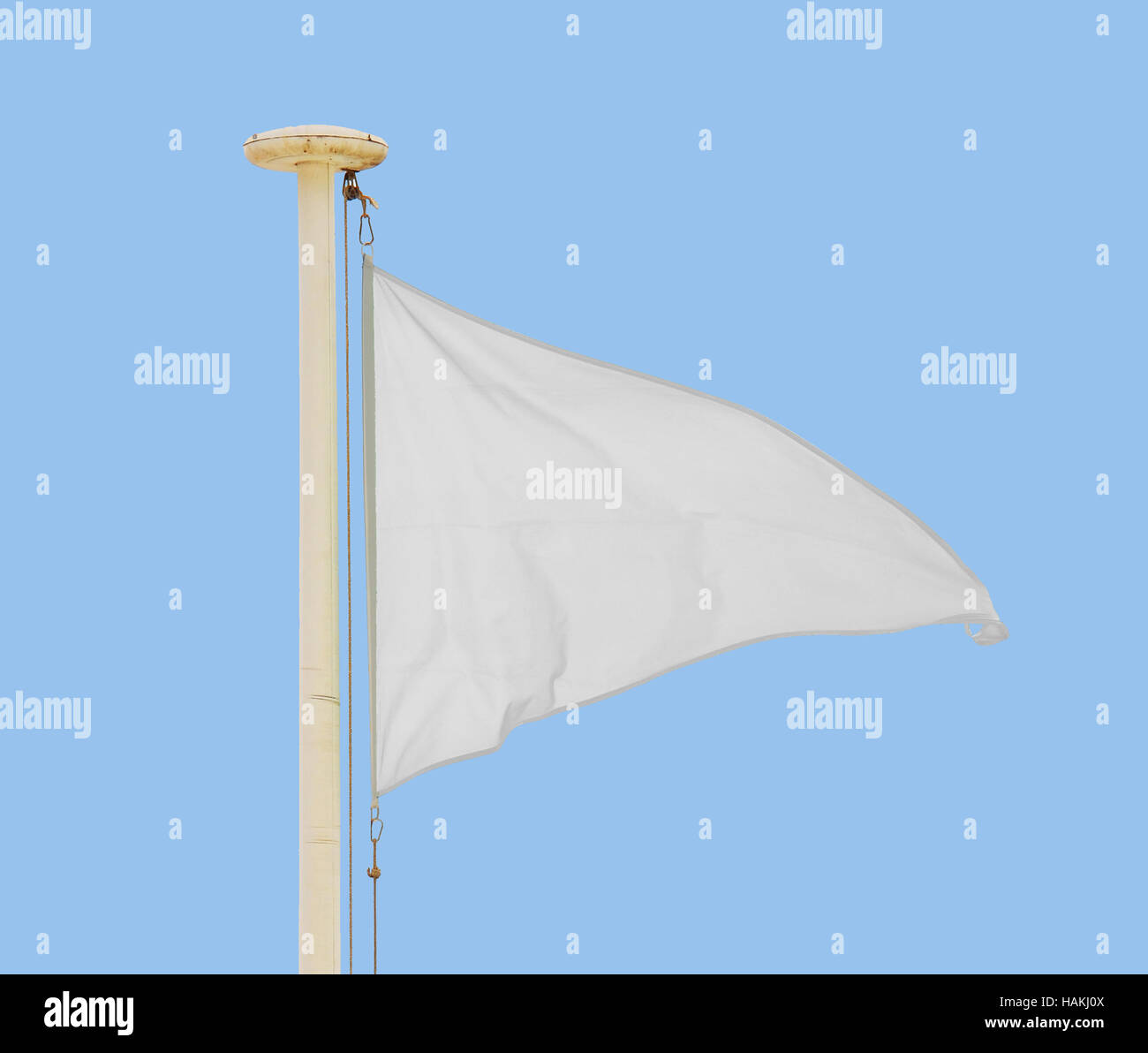 White pennant flying in a brisk breeze against a pale blue sky Stock ...