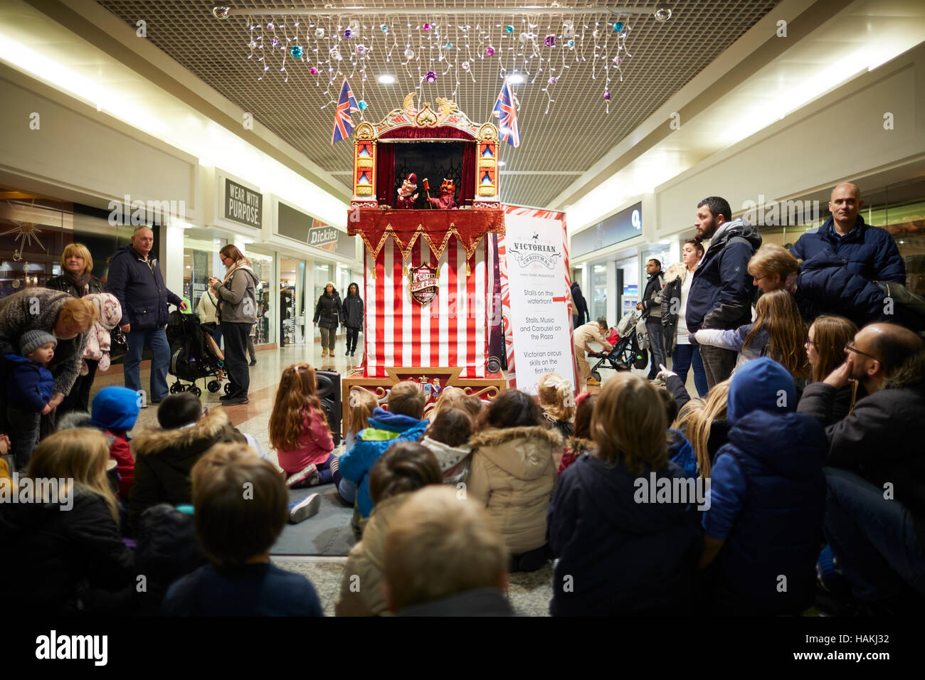 Such and jody busy Children watching in mall shopping centre complex ...