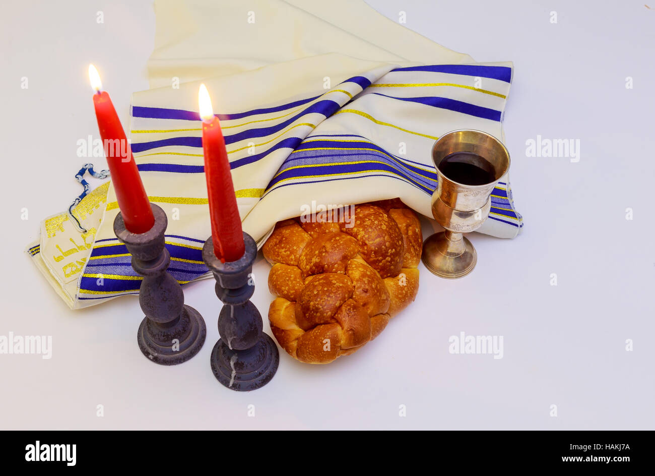 Shabbat candles in glass Jewish holiday Sabbath Prayer Shawl Tallit and ...