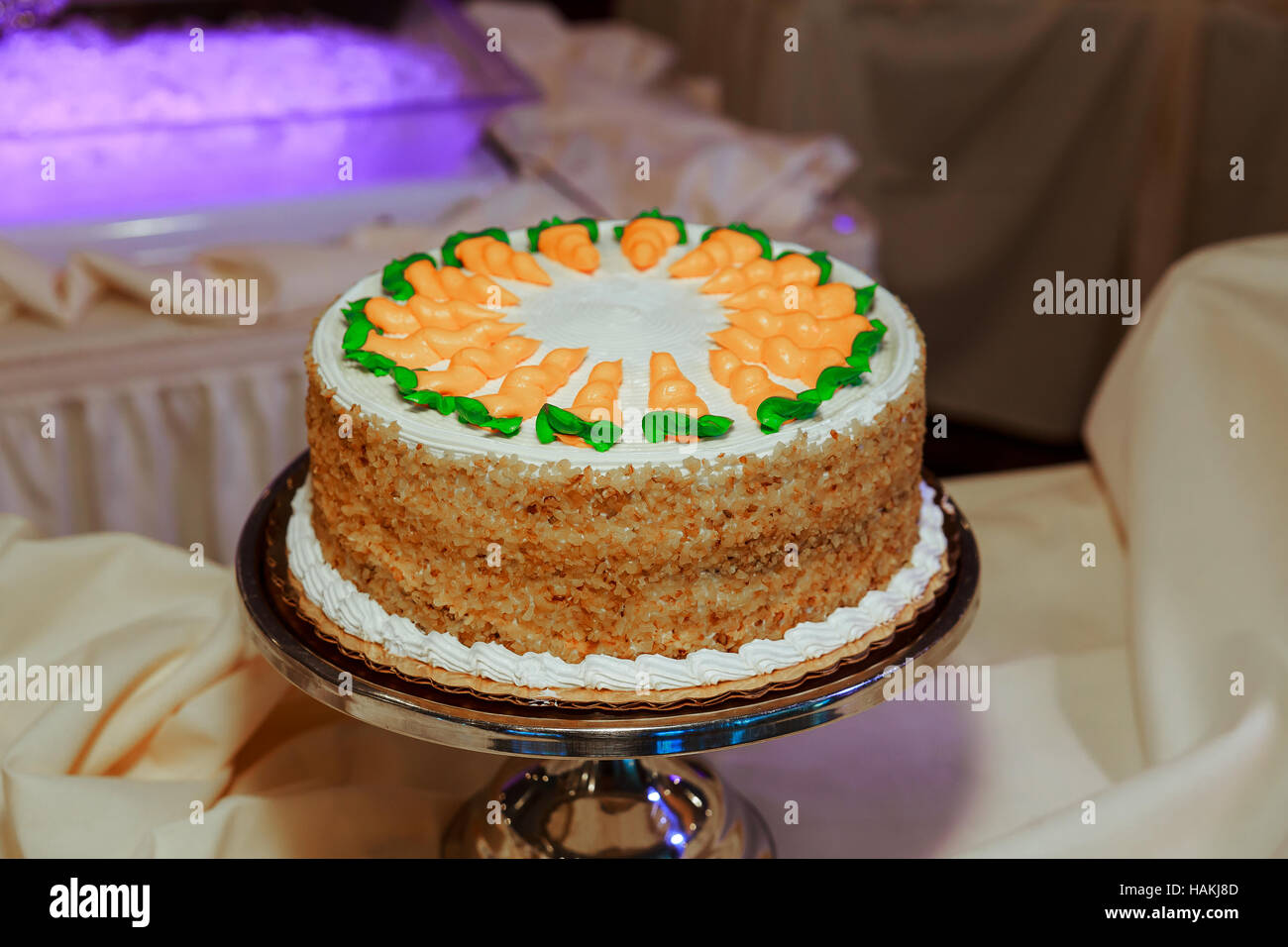 Wedding decoration with colorful eclairs, souffle, meringues, muffins ...