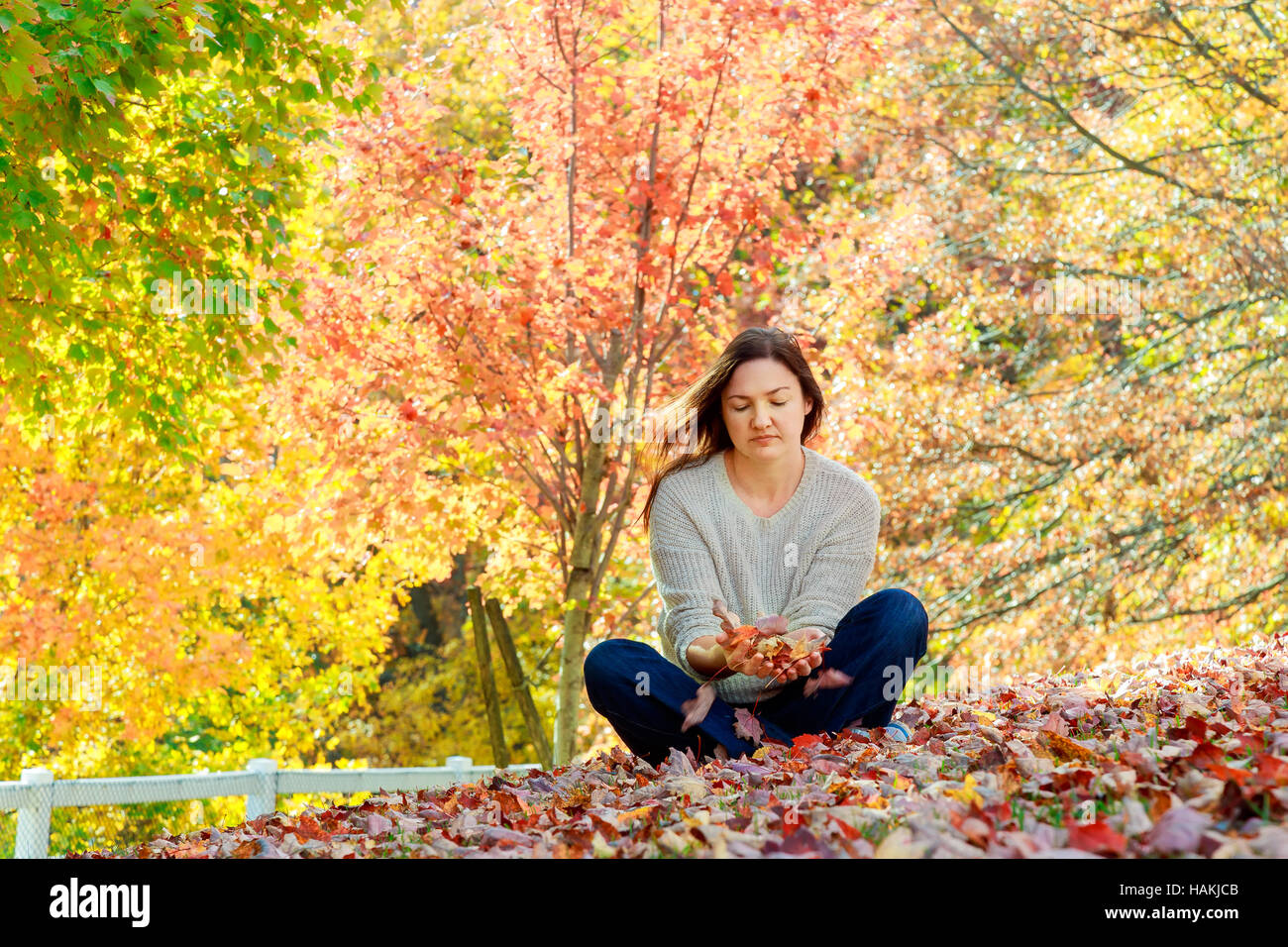 Cheerful woman relaxing in beautiful autumn day Stock Photo - Alamy