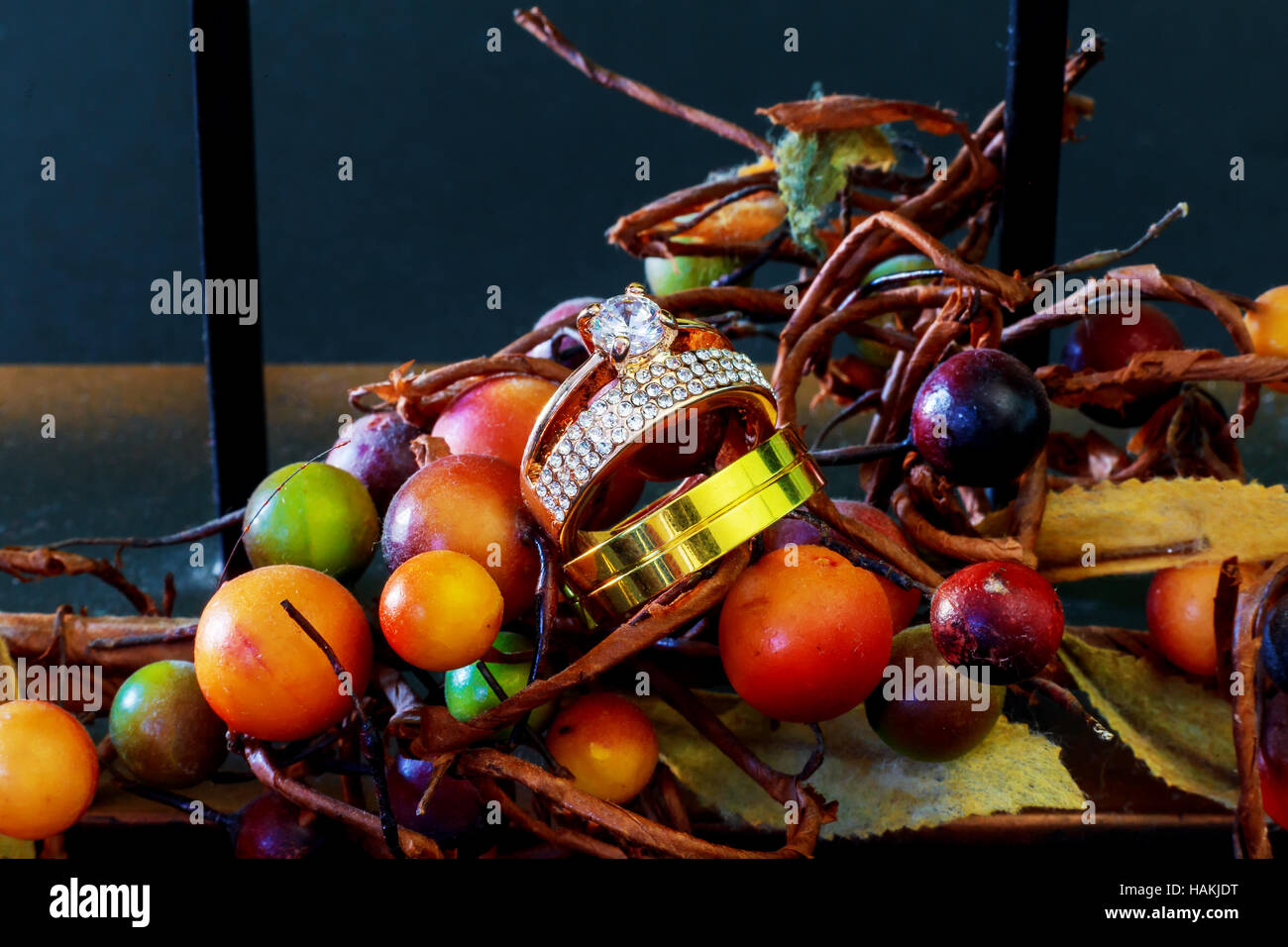 Wedding rings connected with pink ribbon Stock Photo - Alamy