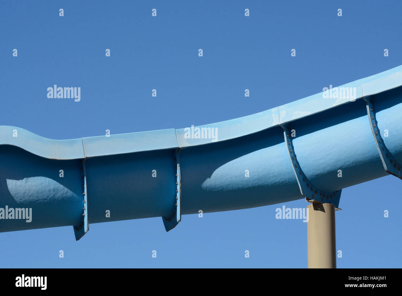 Empty Water Slide against winter blue sky Stock Photo - Alamy