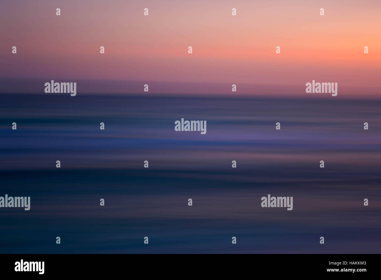 Motion pink and purple beach sunset Stock Photo - Alamy