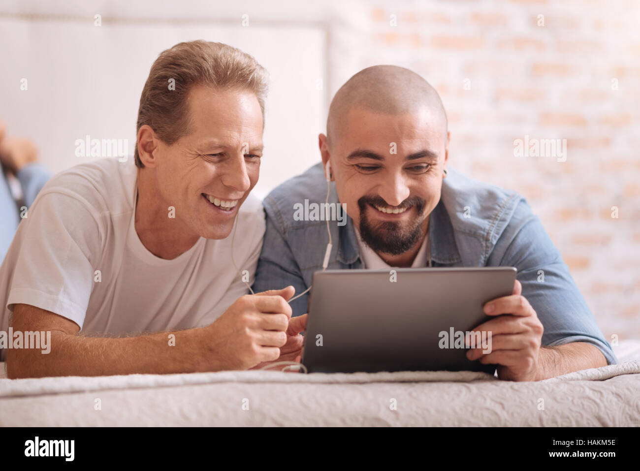 Two men watching hi-res stock photography and images - Alamy