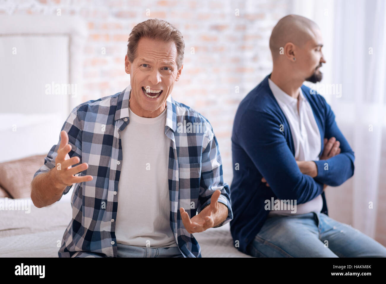 Hateful man shouting at home Stock Photo - Alamy