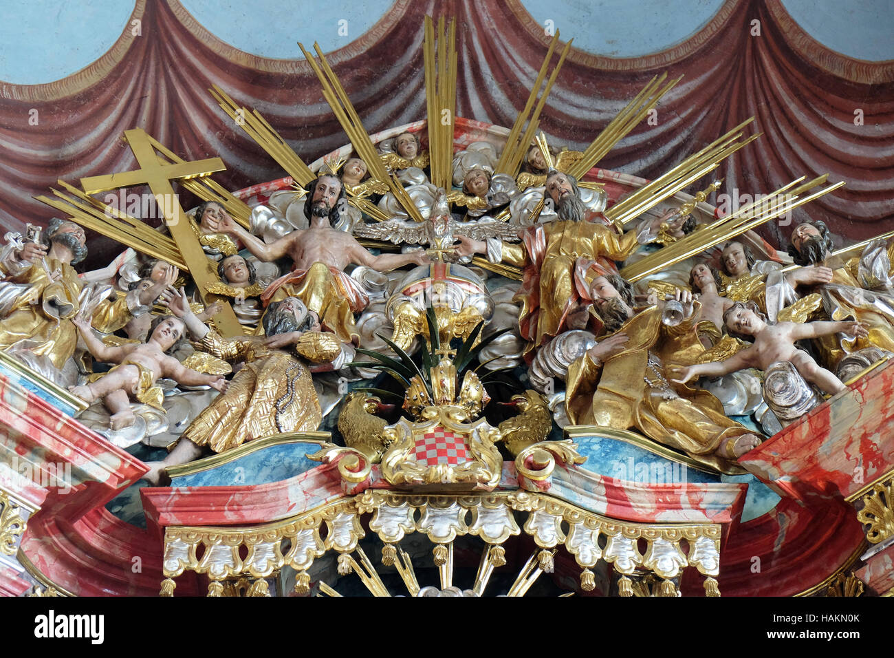 Holy Trinity on the main altar in parish Church of Our Lady of snow in ...