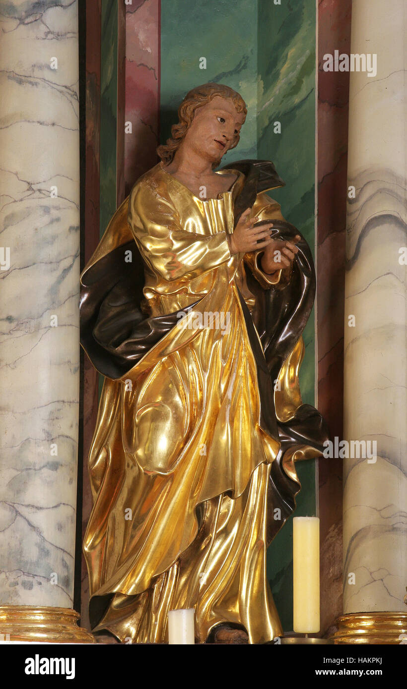 Saint John statue on the altar Adoration of Magi in parish church of ...