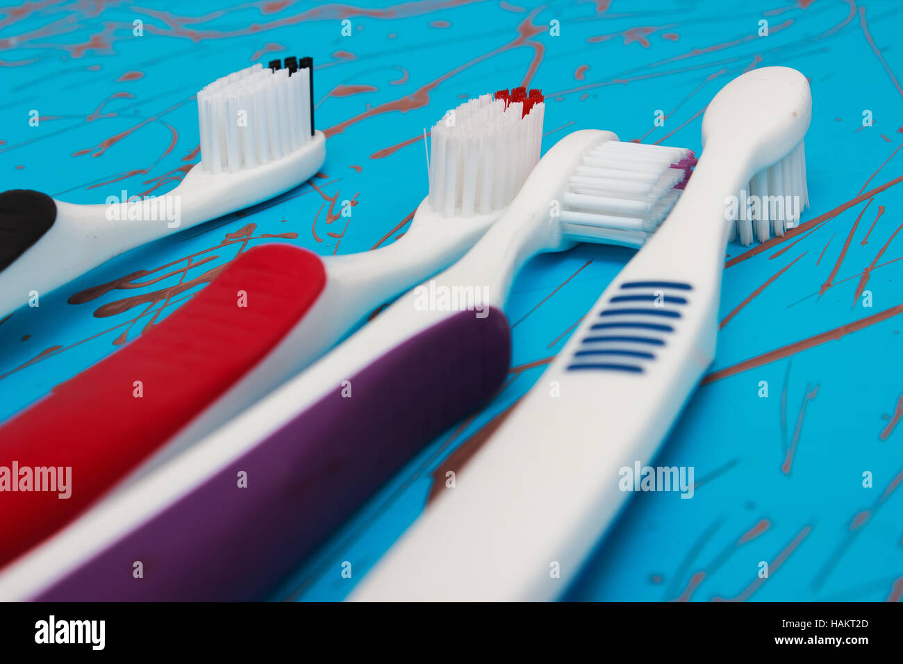 Manual toothbrush set isolated on blue background Stock Photo - Alamy