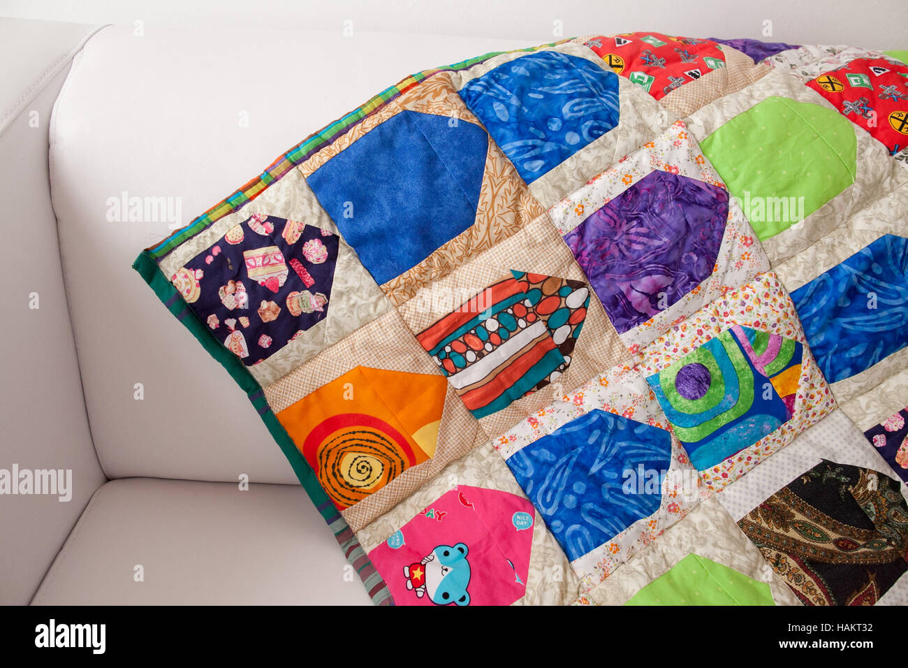 Patchwork quilt. Part of patchwork quilt as background. Handmade ...