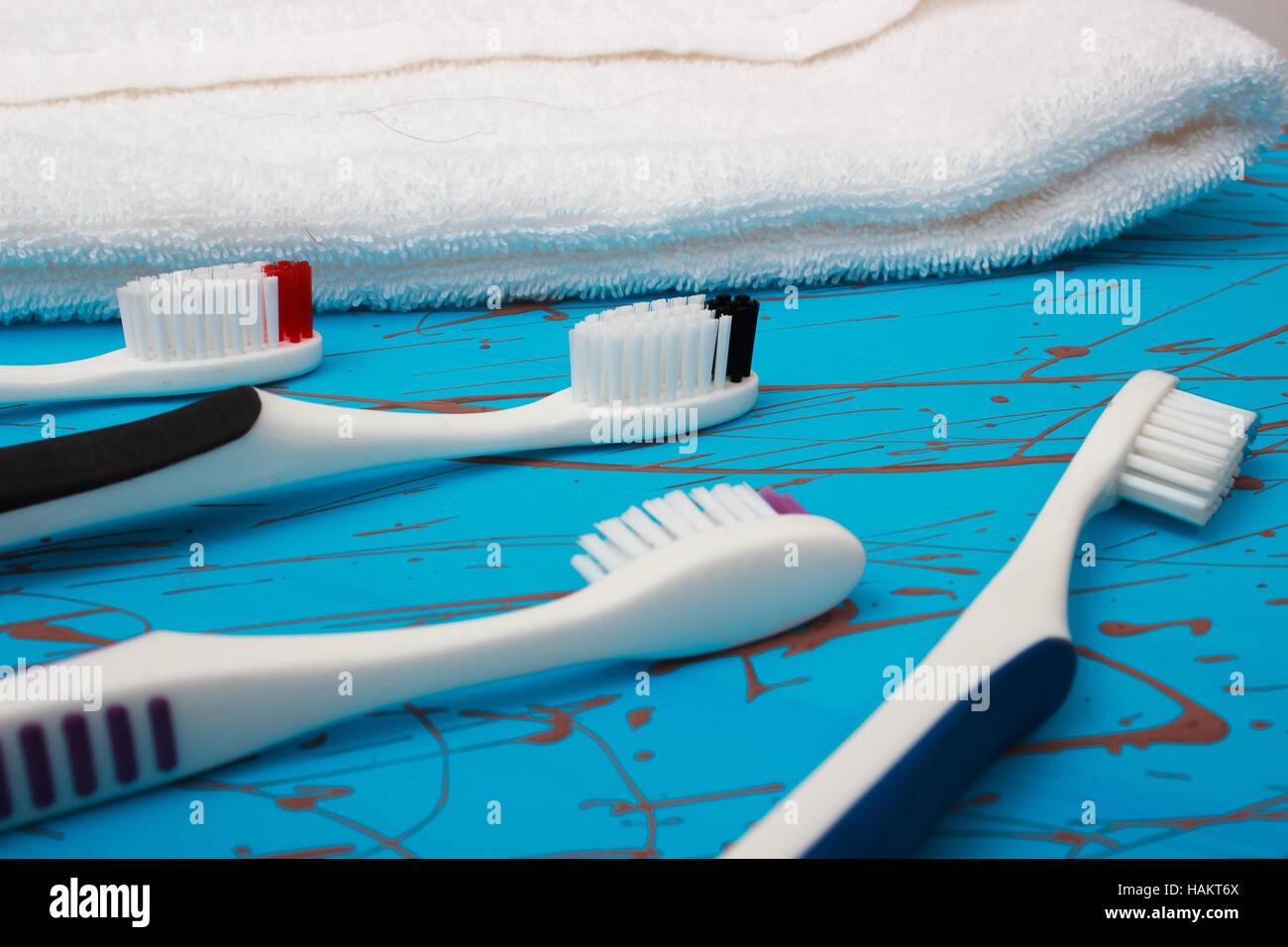 Manual toothbrush set isolated on blue background Stock Photo - Alamy