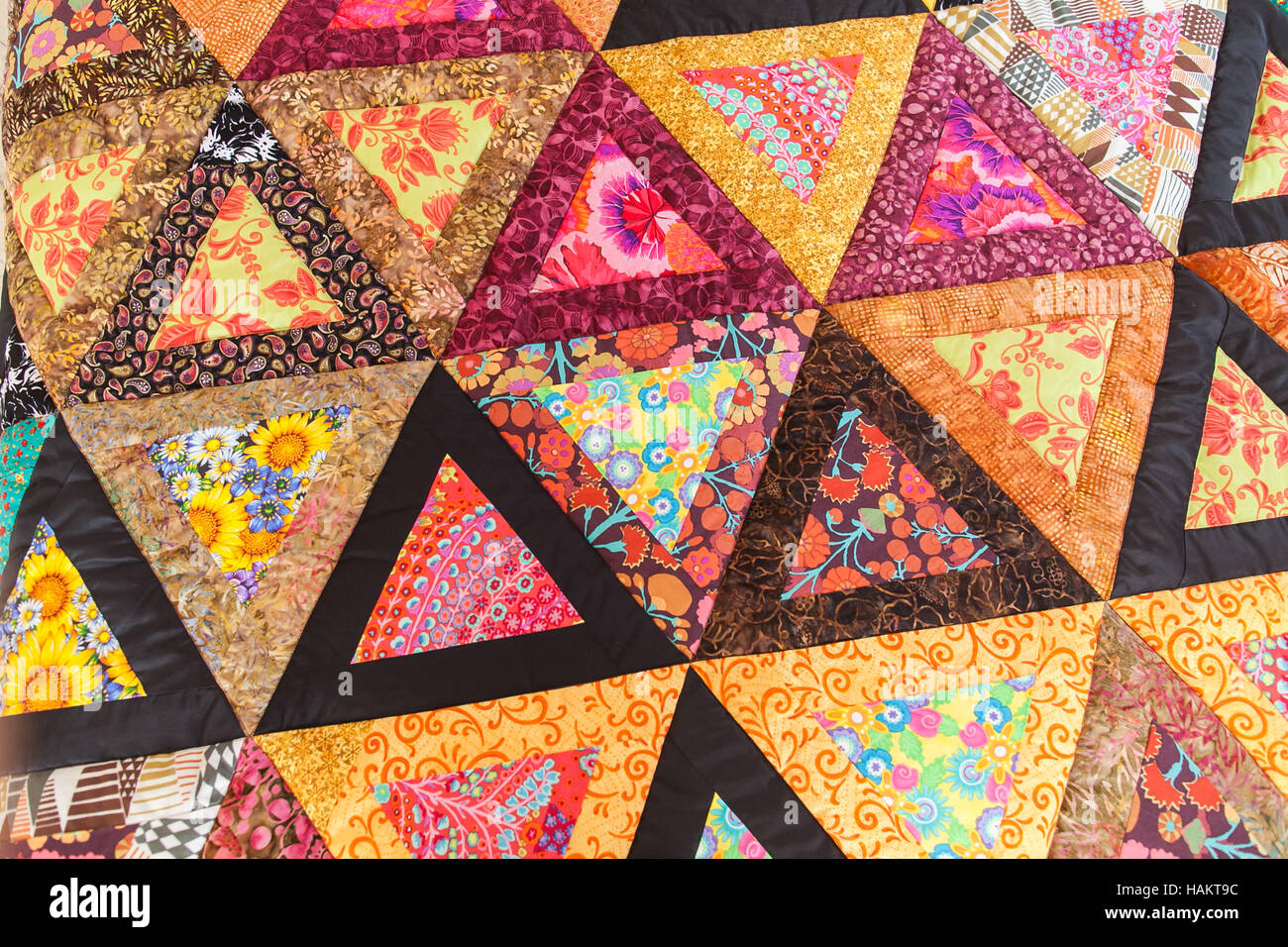Patchwork quilt. Part of patchwork quilt as background. Handmade ...