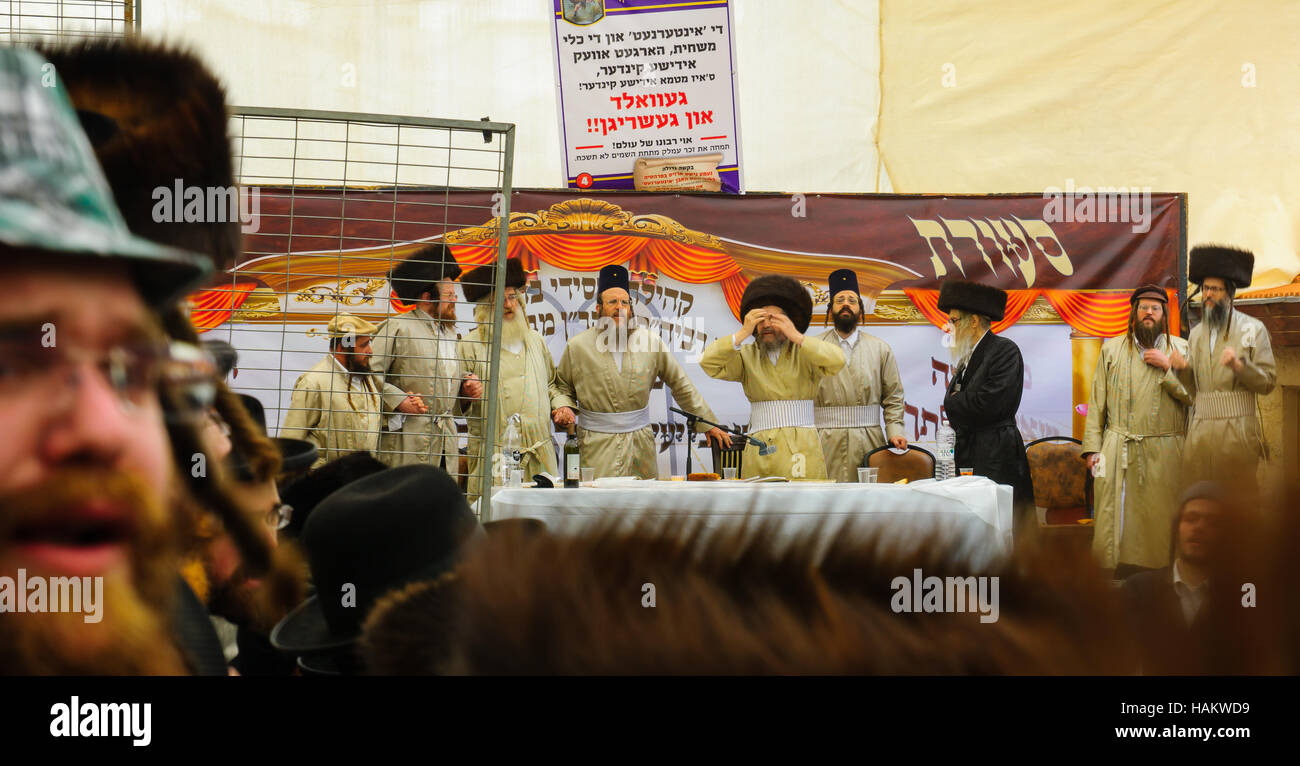JERUSALEM, ISRAEL - MARCH 25, 2016: A crowd and their Rabbi, part of a ...
