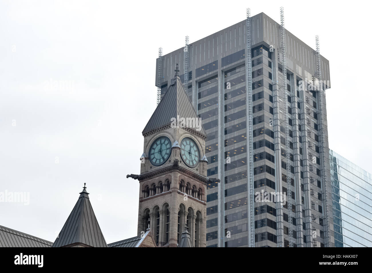 Old city hall clock tower and skyscraper in Toronto downtown Stock ...