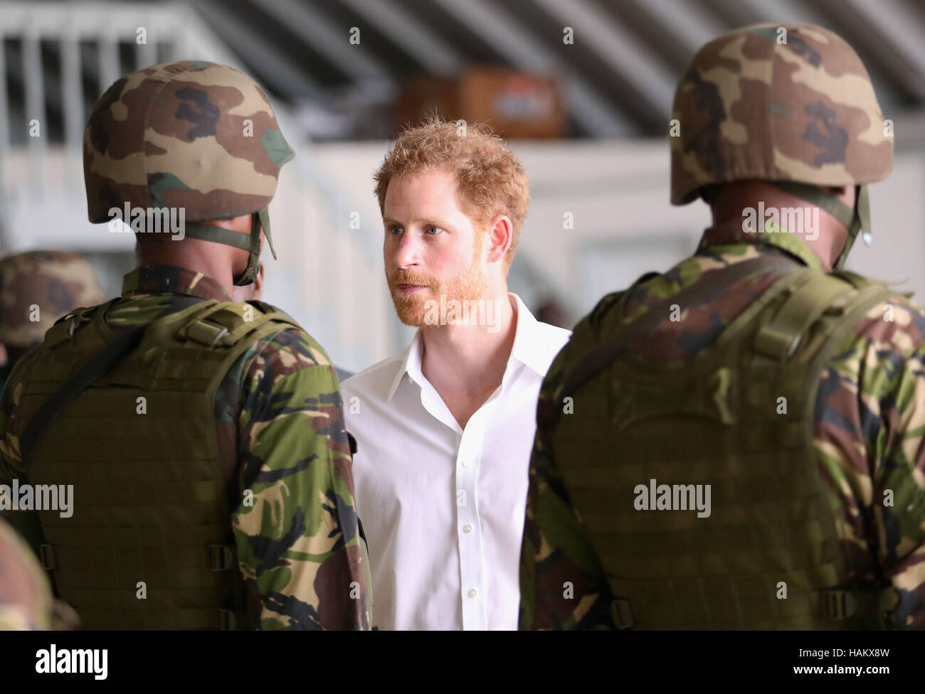 Prince Harry to members of the Barbados Defence Force during a visit to ...