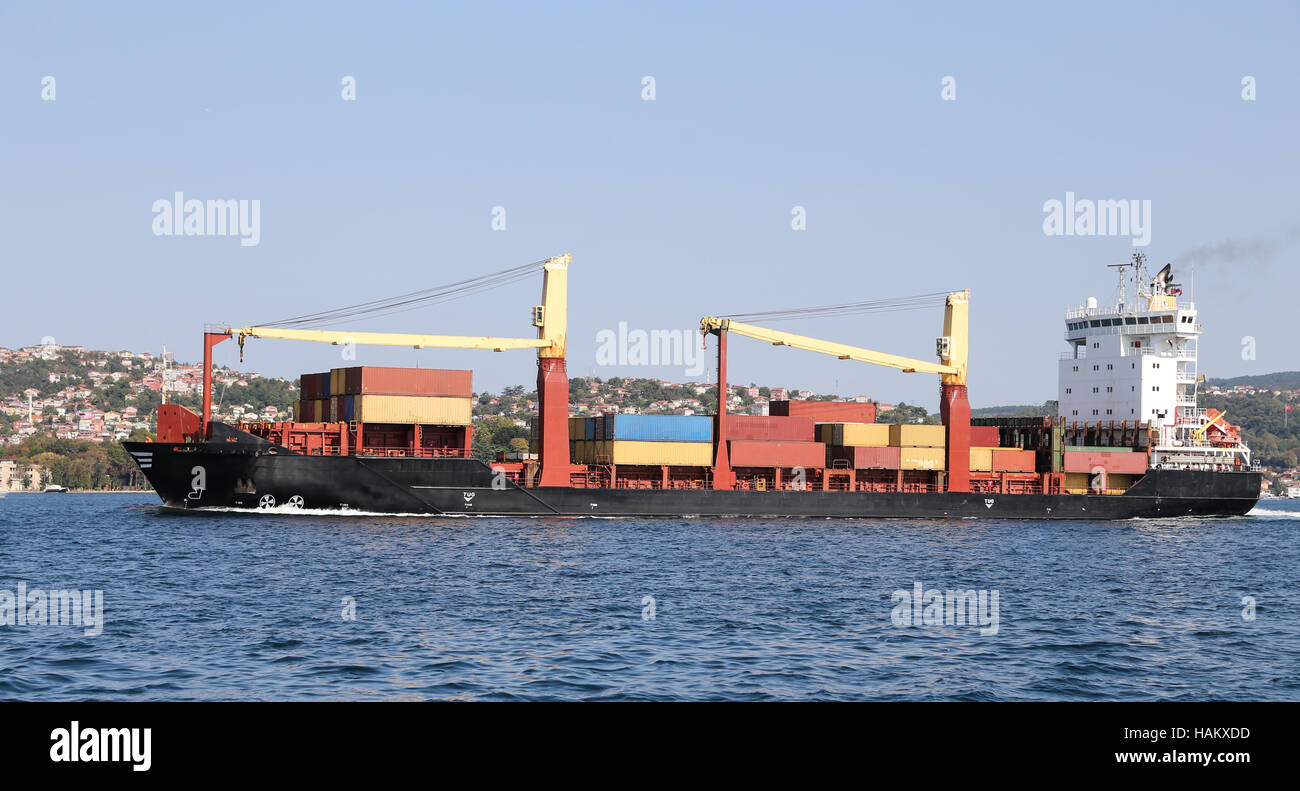 A container ship carrying goods between ports Stock Photo - Alamy