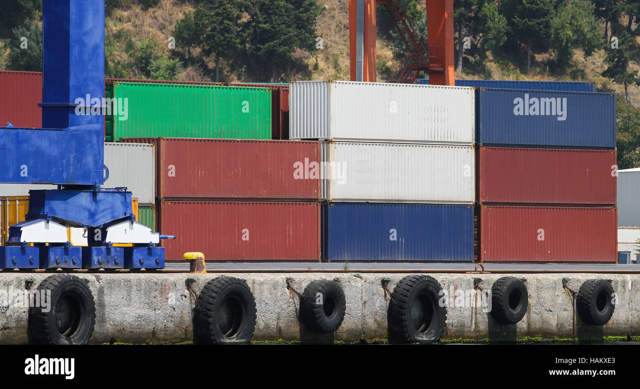 Containers waiting to transfer in a port Stock Photo - Alamy