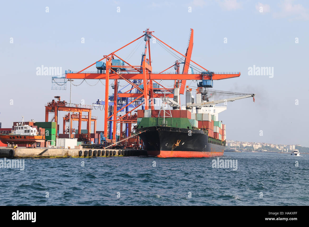 Container Ship is loading in a port Stock Photo - Alamy