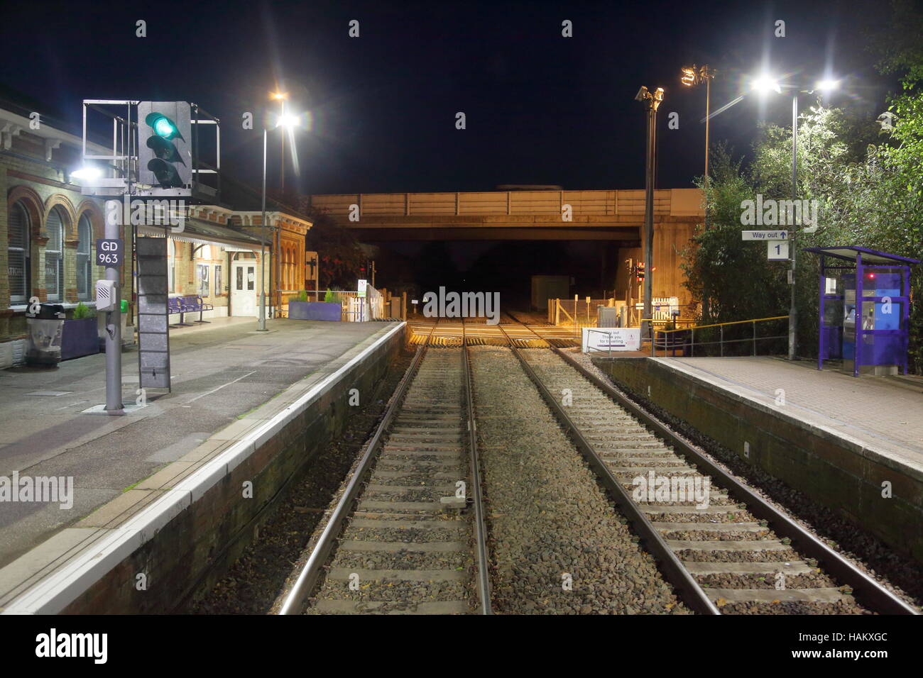 Looking towards an open level crossing with a green signal and a clear ...