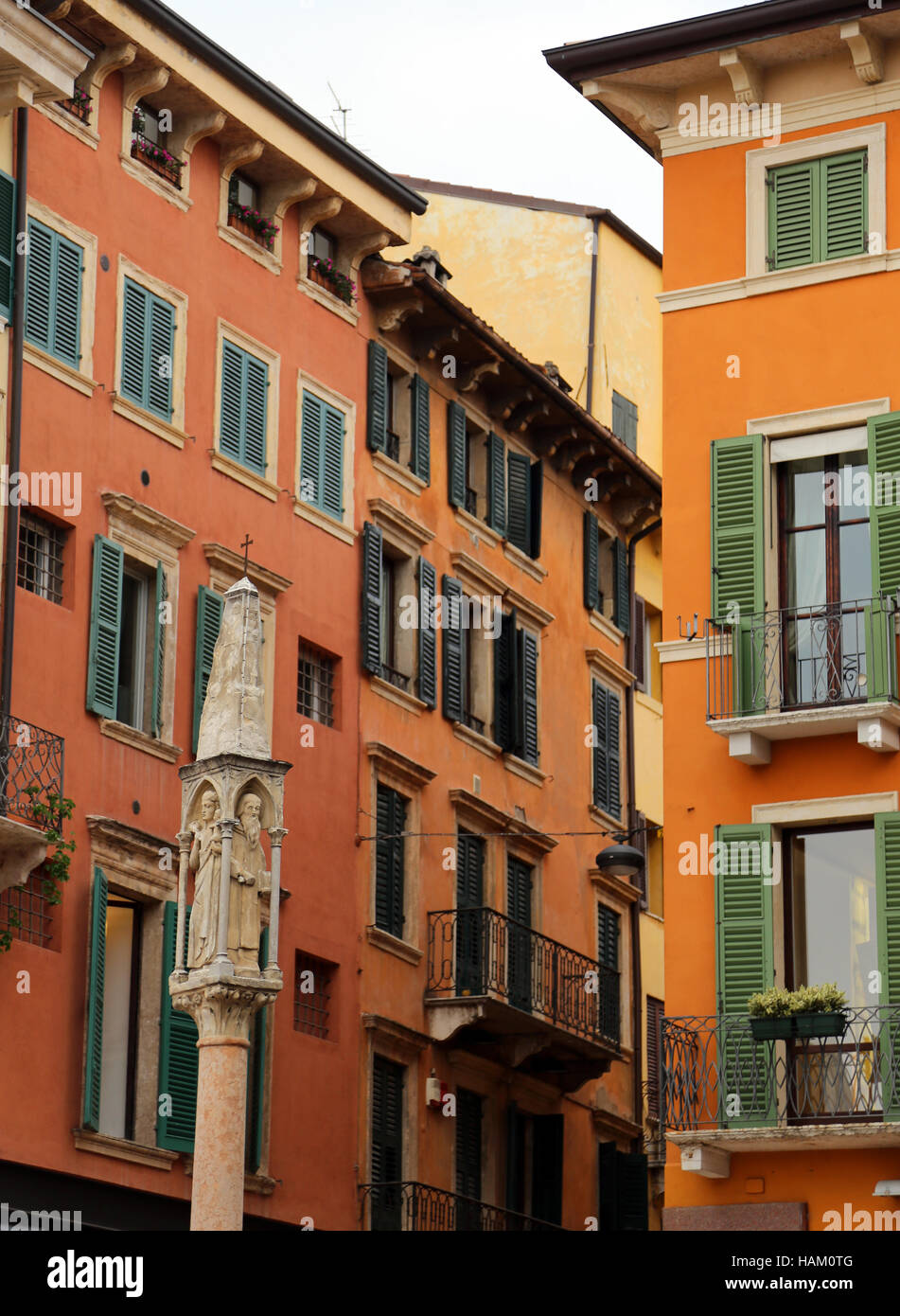 column with statues in the street of the historic city center of Verona ...