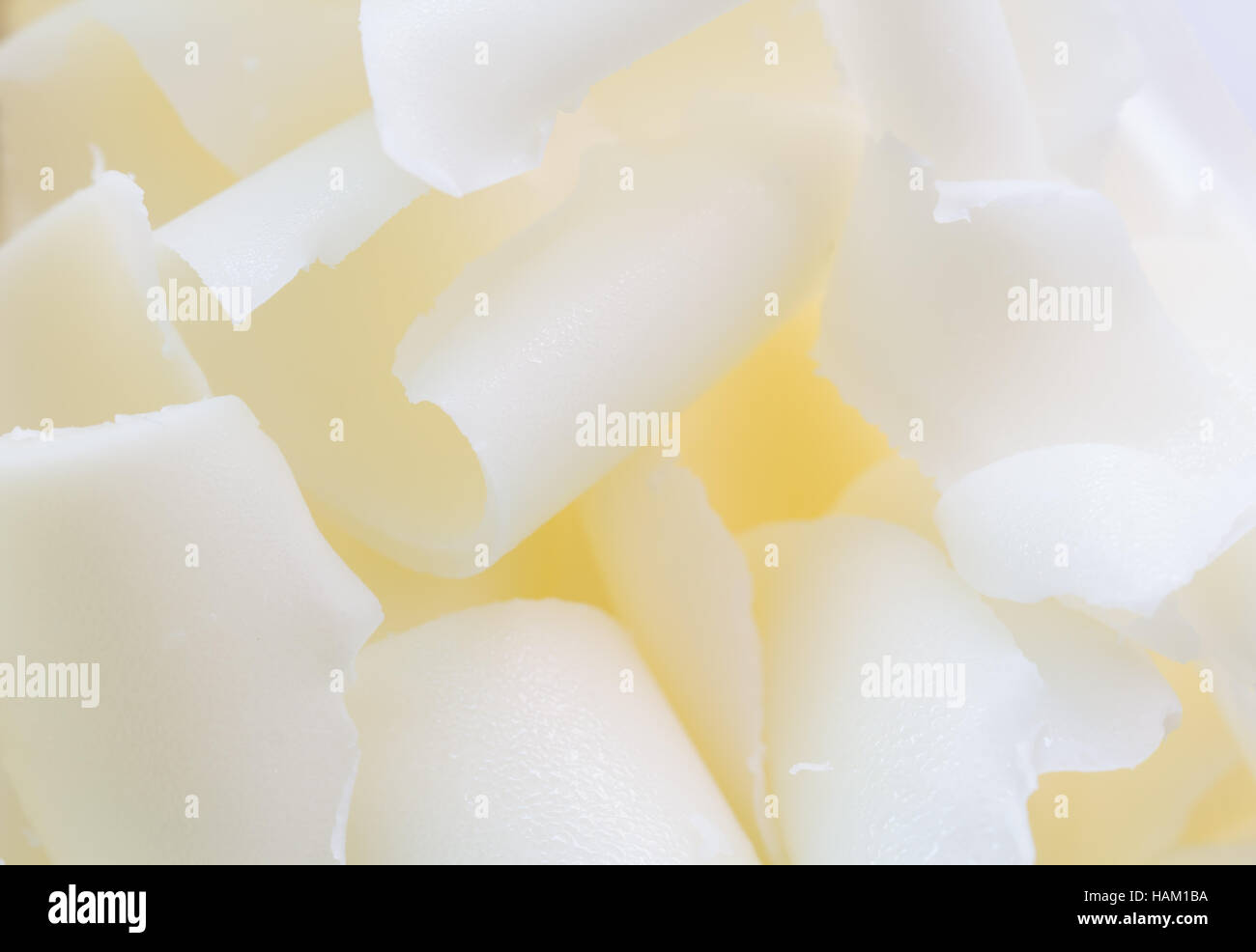 close up of pile grate white chocolate Stock Photo - Alamy