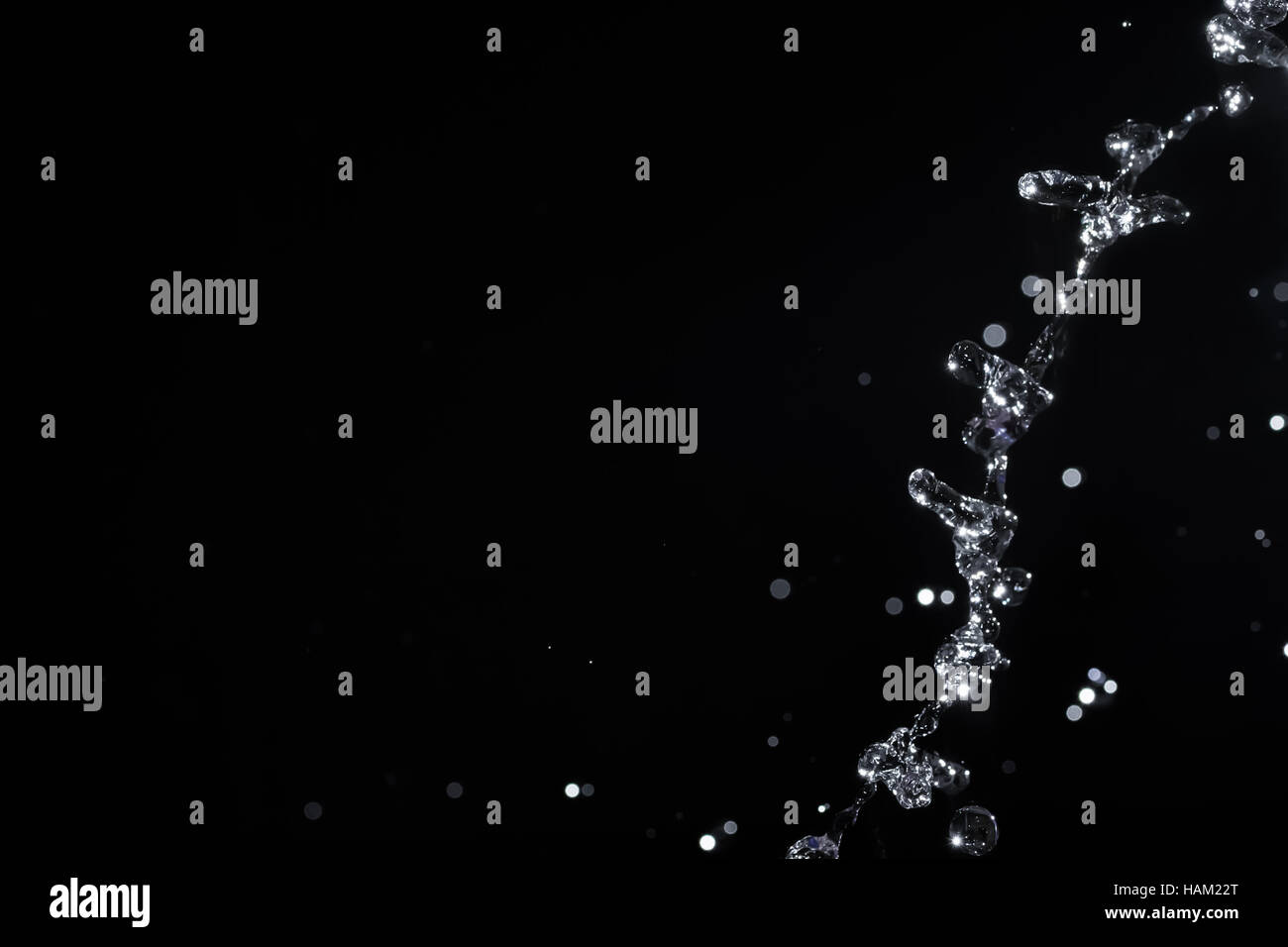 Water splash on black background Stock Photo - Alamy