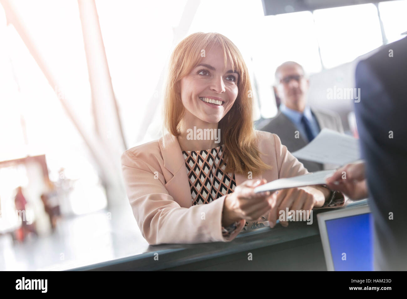 Boarding pass airport counter hi-res stock photography and images - Alamy