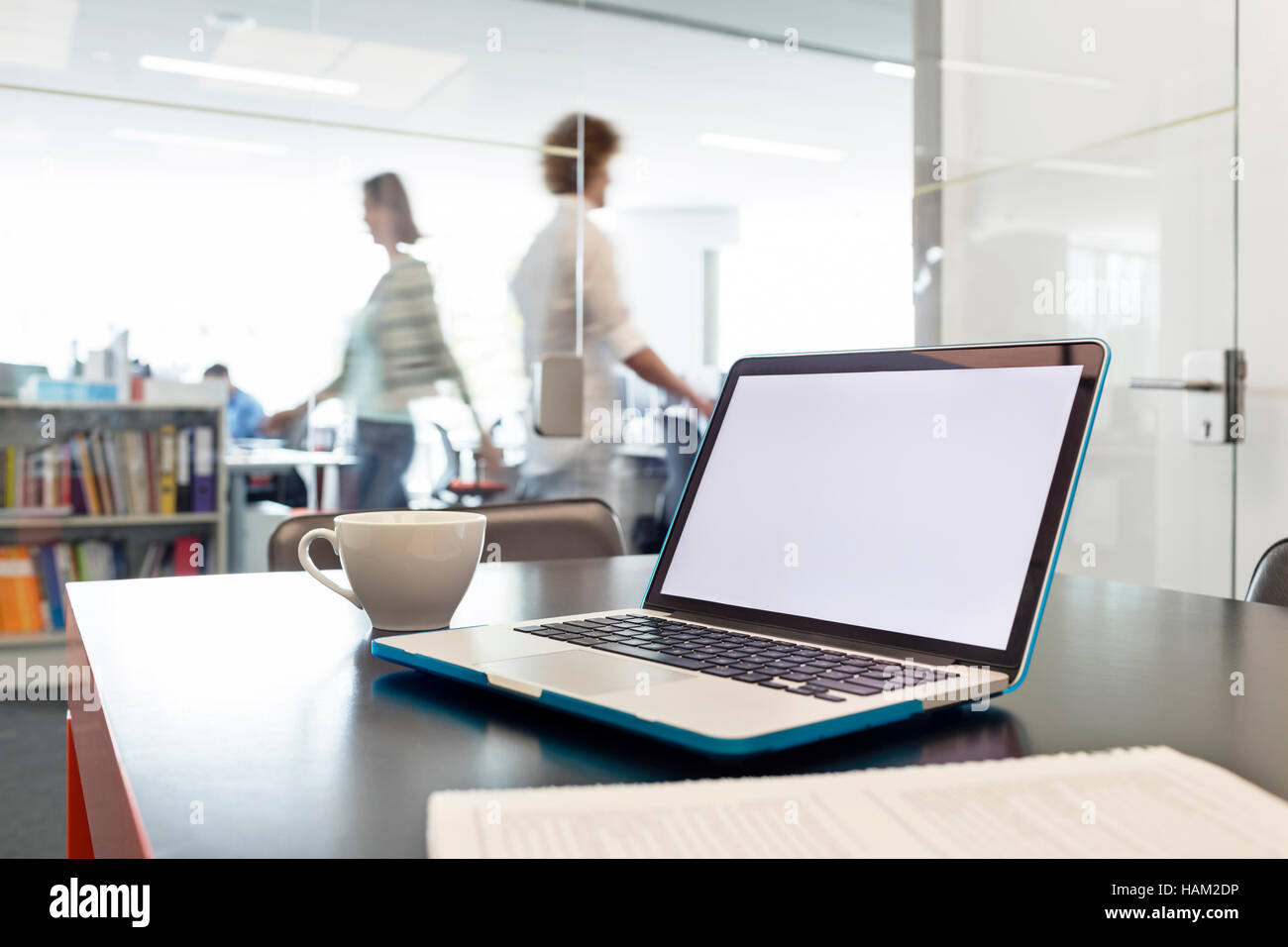 Business woman walking laptop hi-res stock photography and images - Alamy