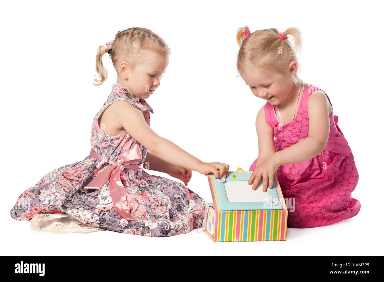 two beautiful girls playing Stock Photo - Alamy