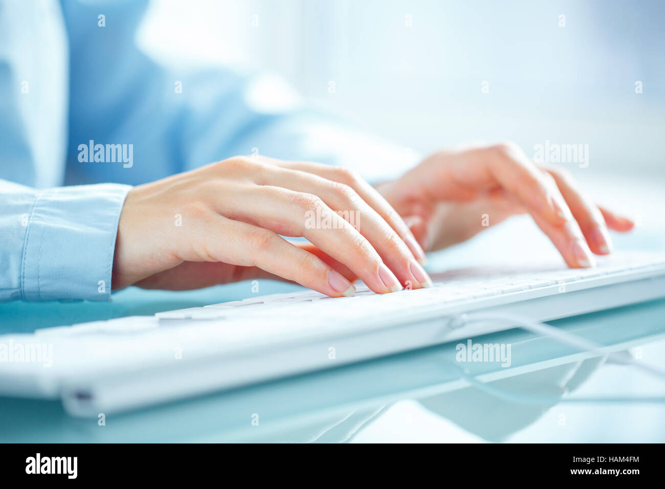 Female hands or woman office worker typing on the keyboard Stock Photo ...