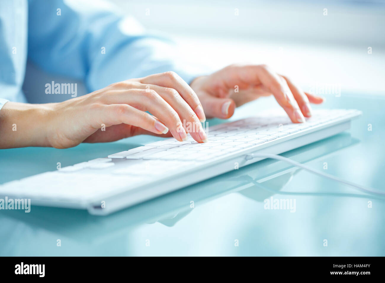Female hands or woman office worker typing on the keyboard Stock Photo ...