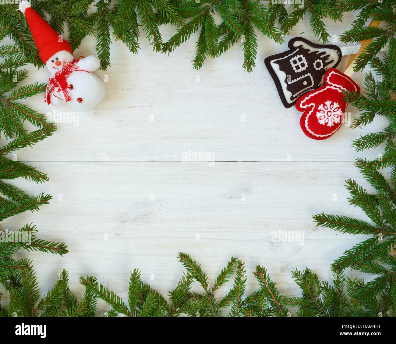 Christmas tree branches christmas decorations on white wooden texture ...