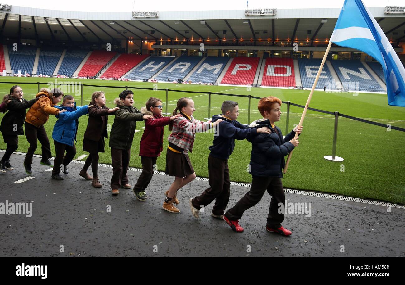 Hundreds of school children, and their teachers, join a giant conga ...