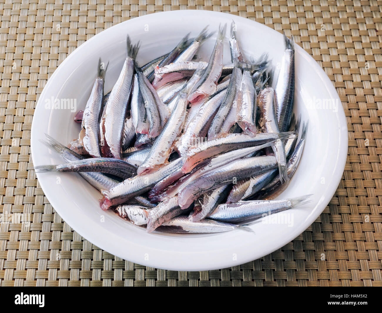 Anchovies headless, cleaned, prepared and ready in the pot, before ...