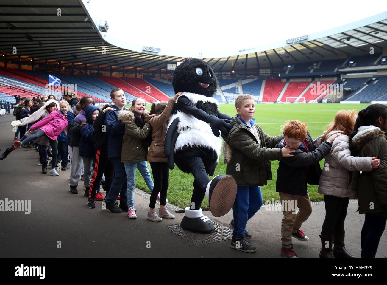 Hundreds of school children, and their teachers, join a giant conga ...