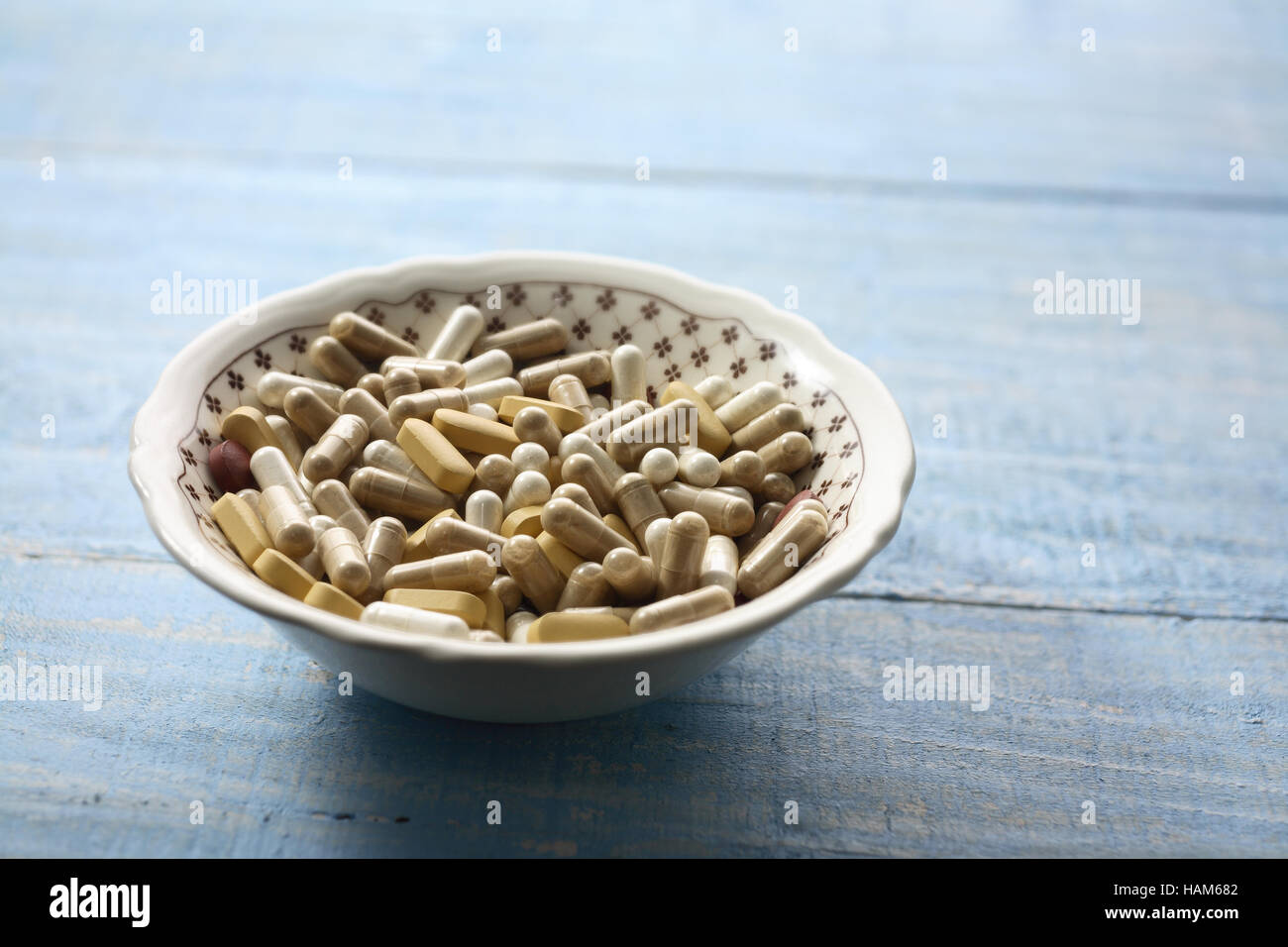 Bowl of Pills Stock Photo - Alamy