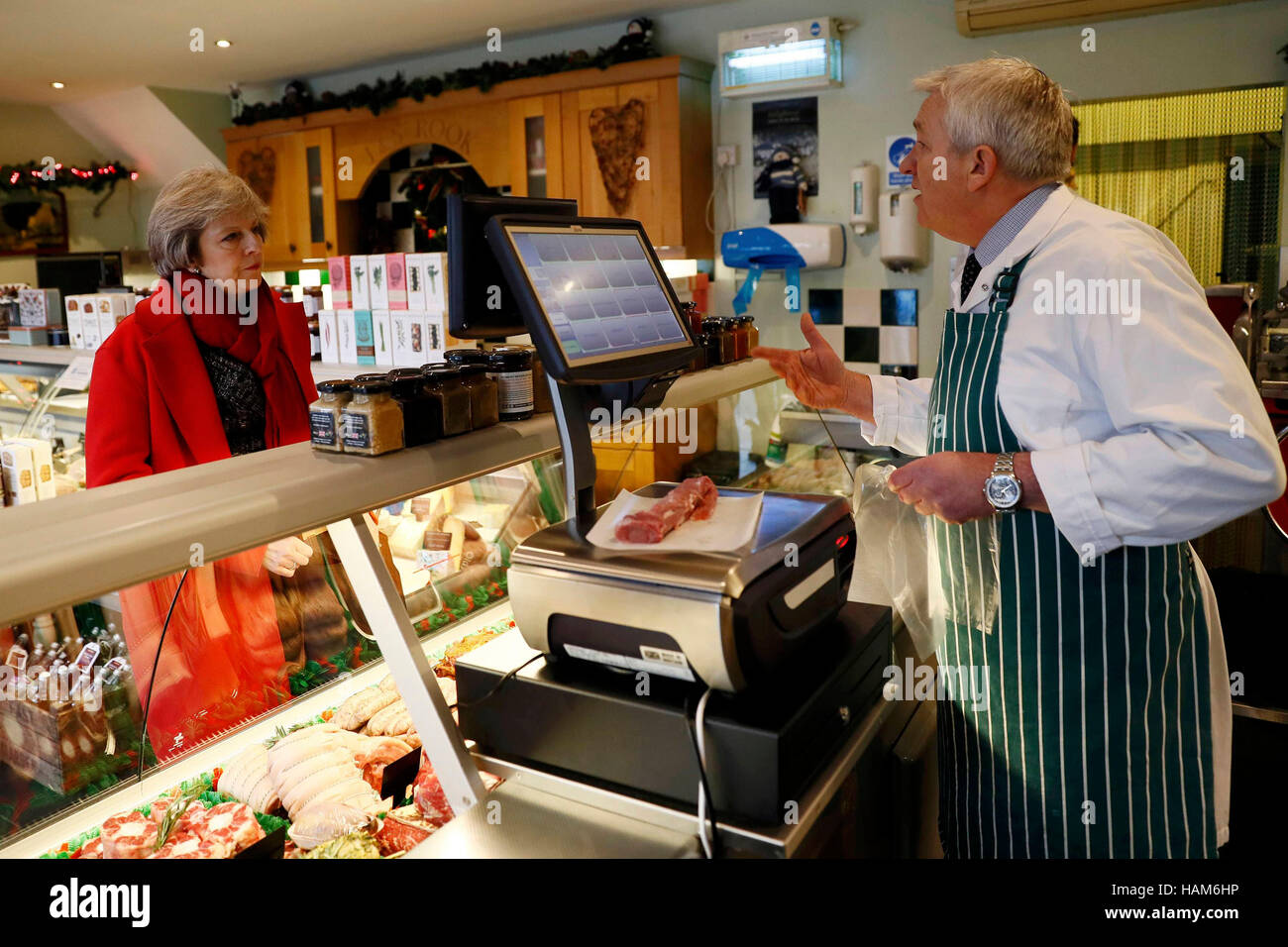 Prime Minister Theresa May speaks with owner Jerry Rook at local ...